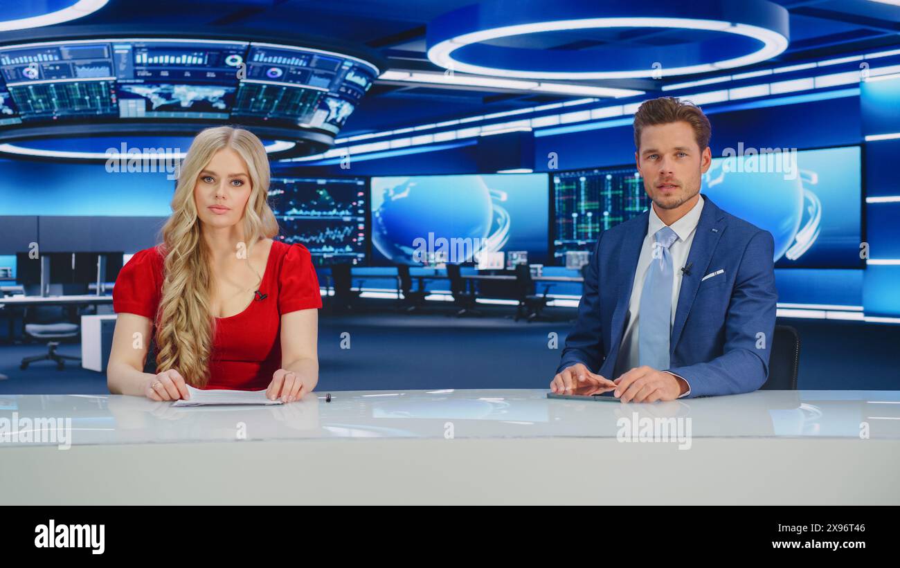 TV Live News Program: Two Presenters Reporting, Discuss Daily Events ...