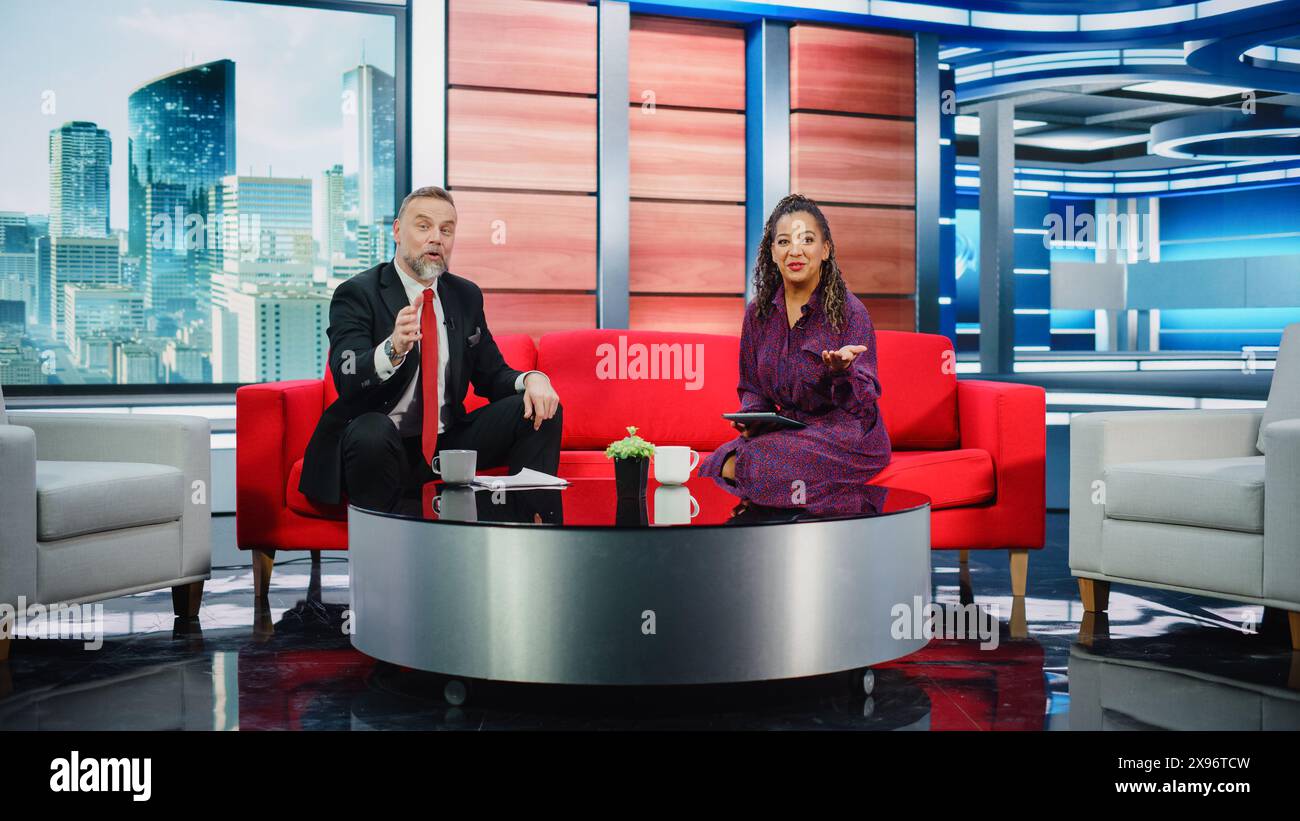 Talk Show TV Program and News Discussion: Two Charismatic Presenters ...