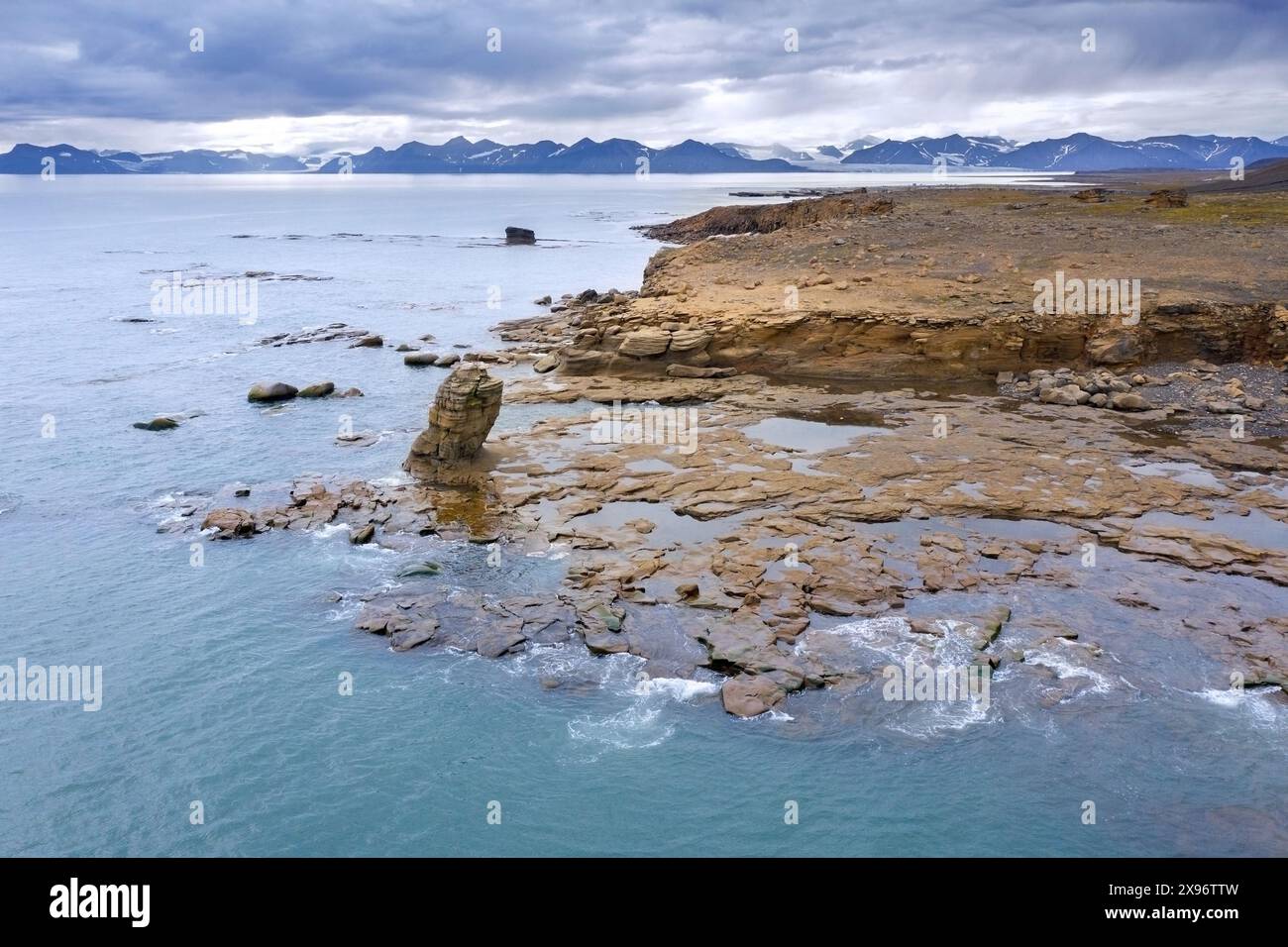 Aerial view over rock formations along the rocky coast of Boltodden in ...