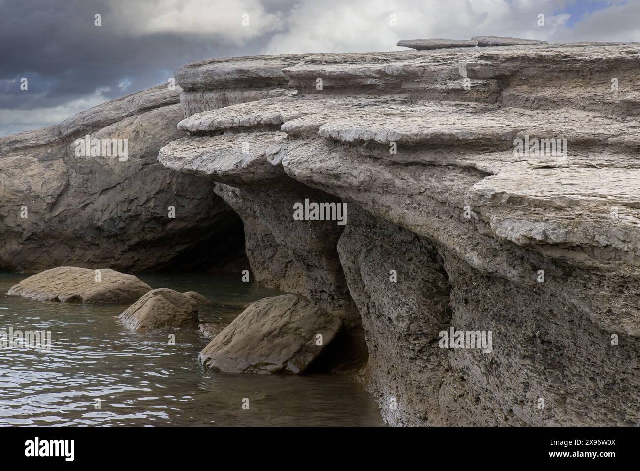 Rock formation showing wind and water erosion along the rocky coast of ...