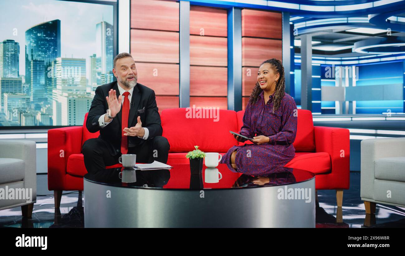 Talk Show TV Program and News Discussion: Two Charismatic Presenters ...