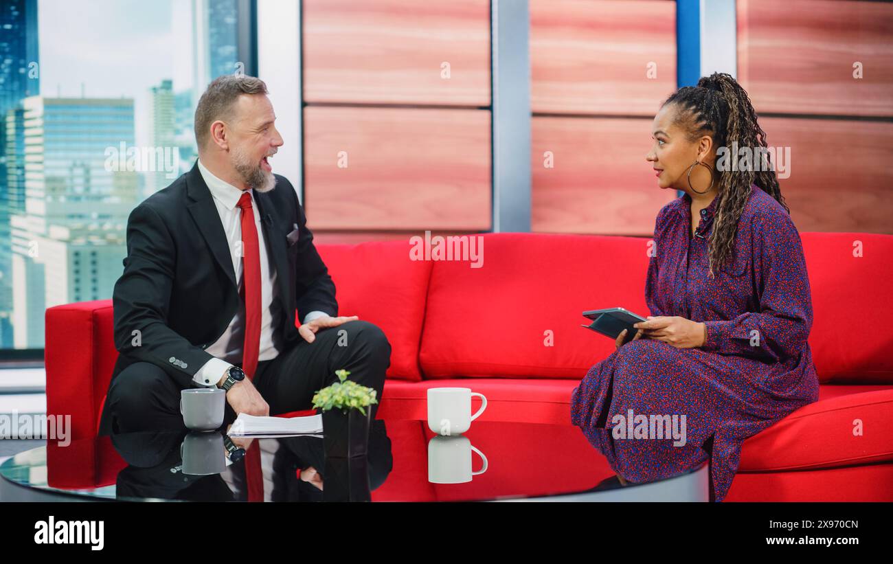 Talk Show TV Program and News Discussion: Two Cheerful Presenters Talk ...