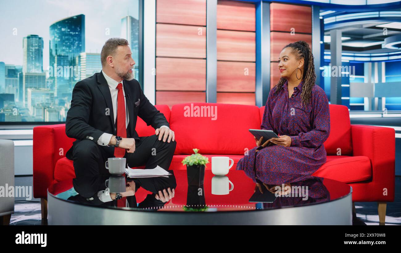 Talk Show TV Program and News Discussion: Two Charismatic Presenters ...