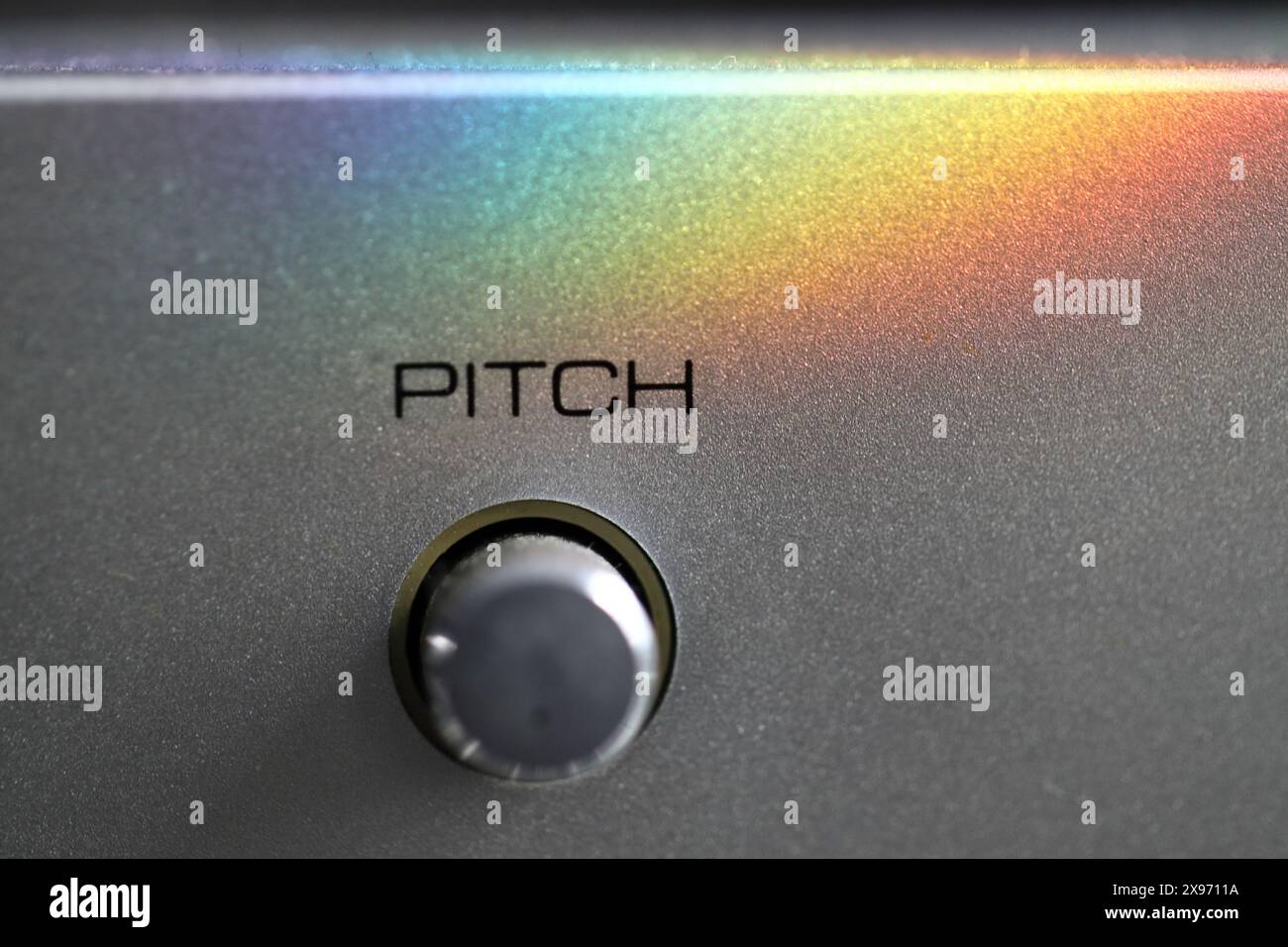 Using a pitch wheel on a MIDI musical keyboard. with rainbow colors ...