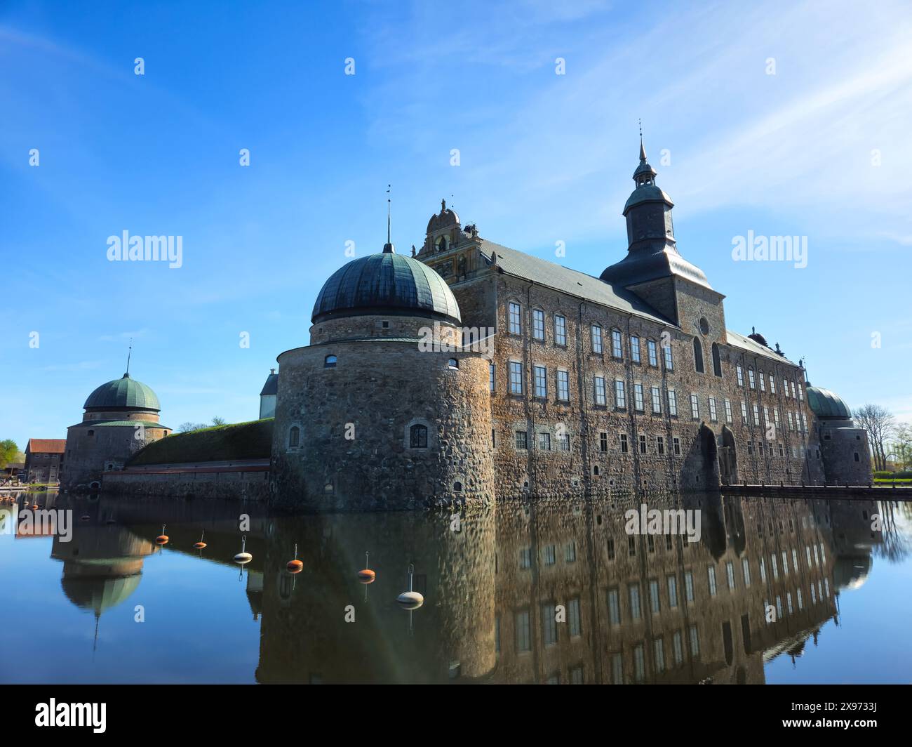 Historical Swedish medieval Vadstena castle with reflection in still ...