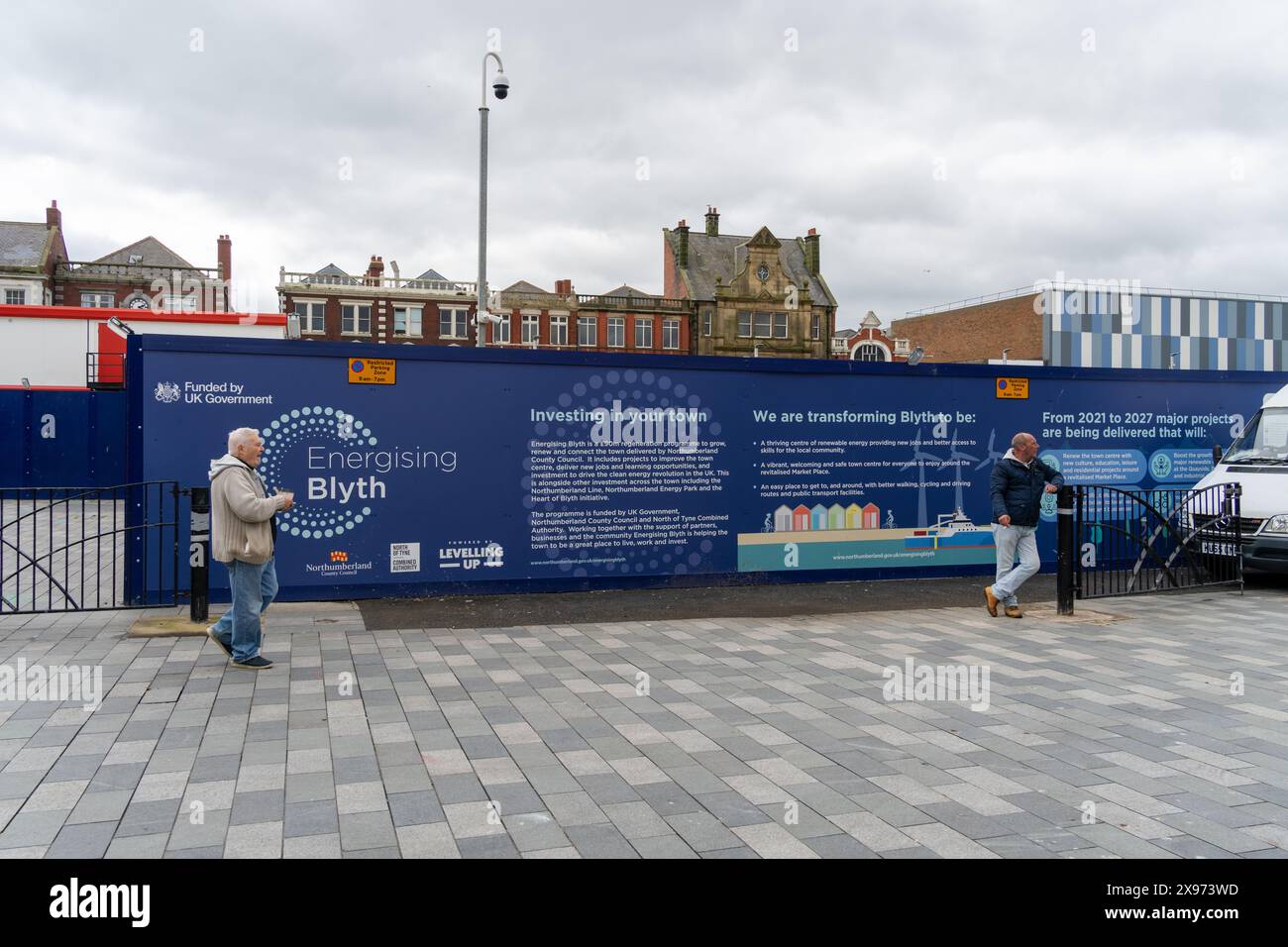 Blyth, Northumberland, UK. People by the signage on the 'Levelling Up ...