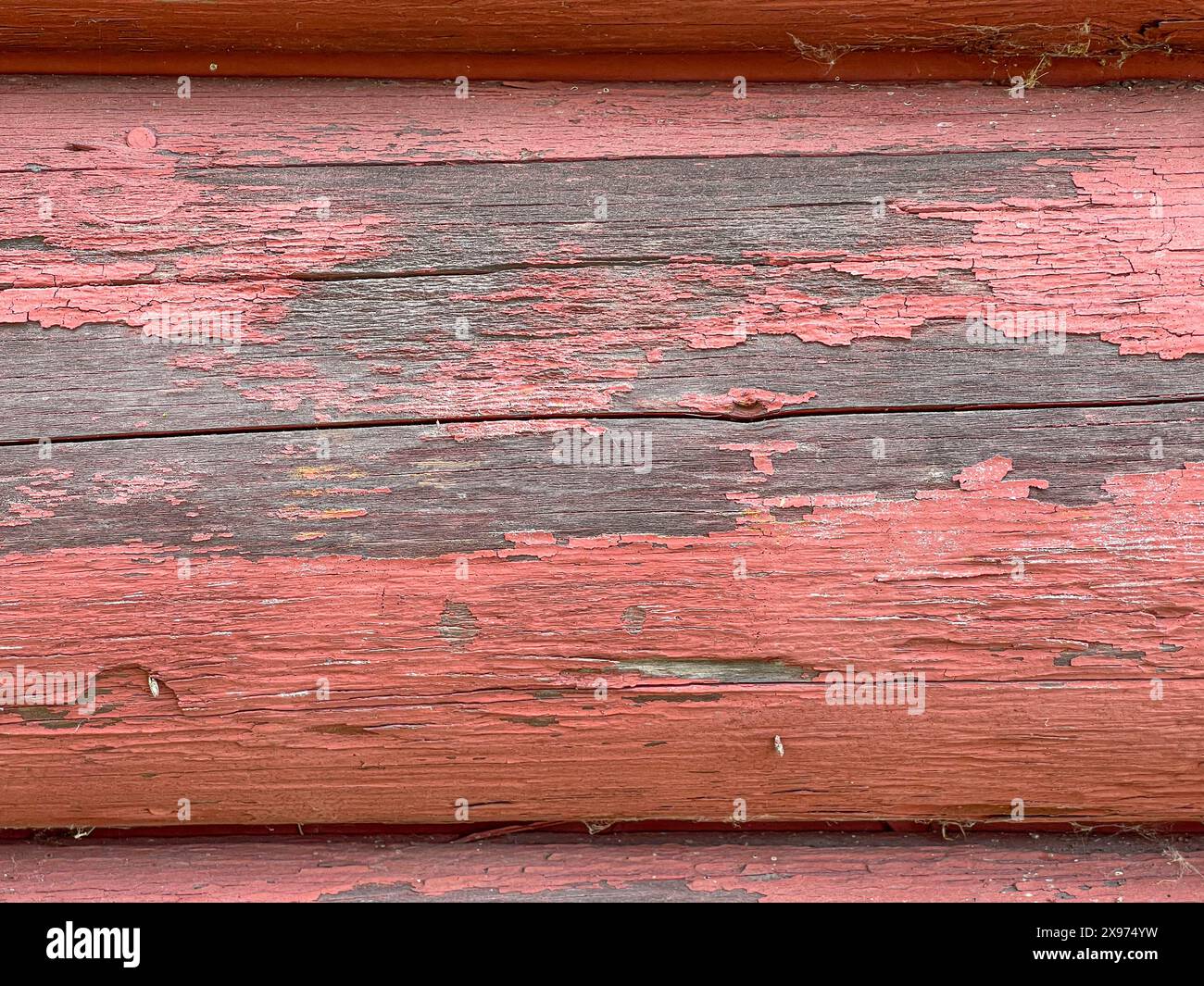 Background Image of Distressed Cabin Logs Painted Red and Weathered ...