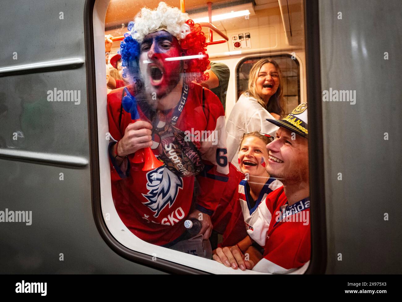 Czech fans celebrate victory in metro after the 2024 IIHF World ...