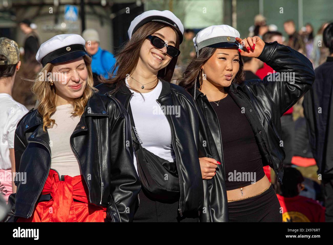 Students with student caps posing for an image on May Day Eve in ...