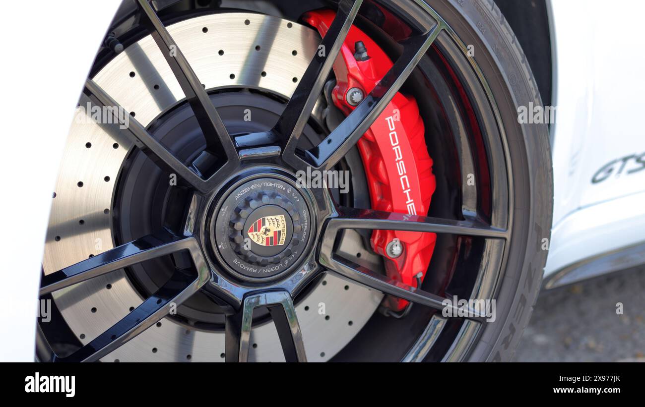 An alloy wheel of Porsche with company logo Stock Photo - Alamy