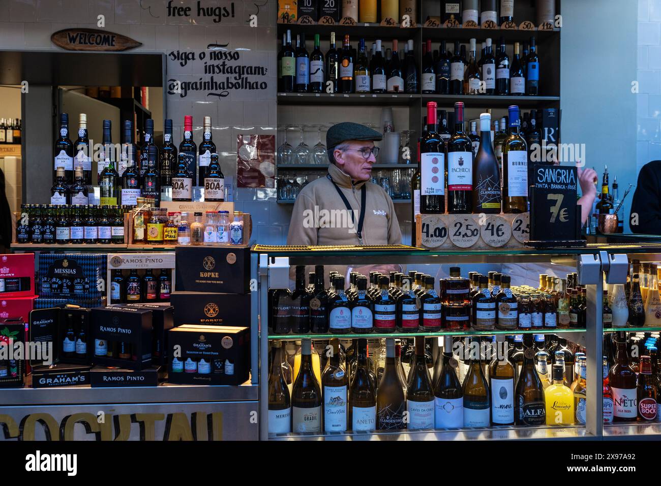 Oporto, Portugal - November 23, 2023: Vendor in his liquor store in ...