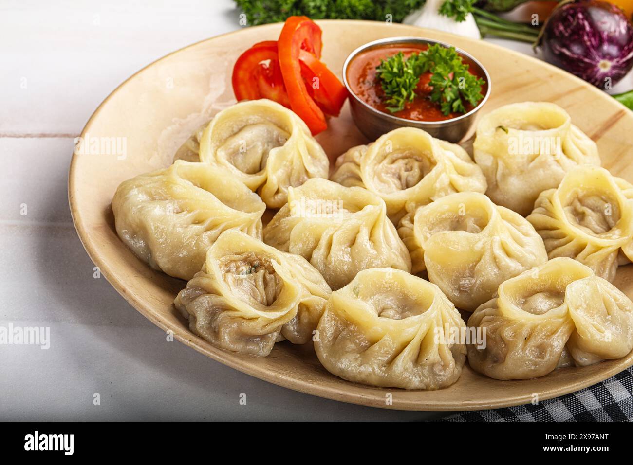Steamed Nepali dumpling Momo with sauce stuffed chicken, meat, seafood ...