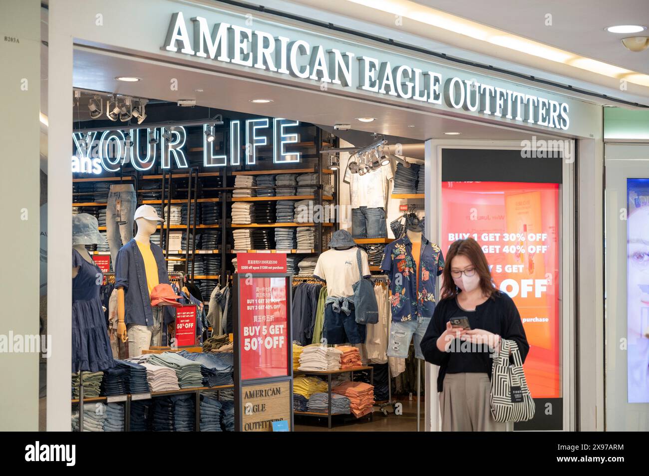 A shopper is seen at the American clothing and accessories retailer American Eagle store in Hong ...