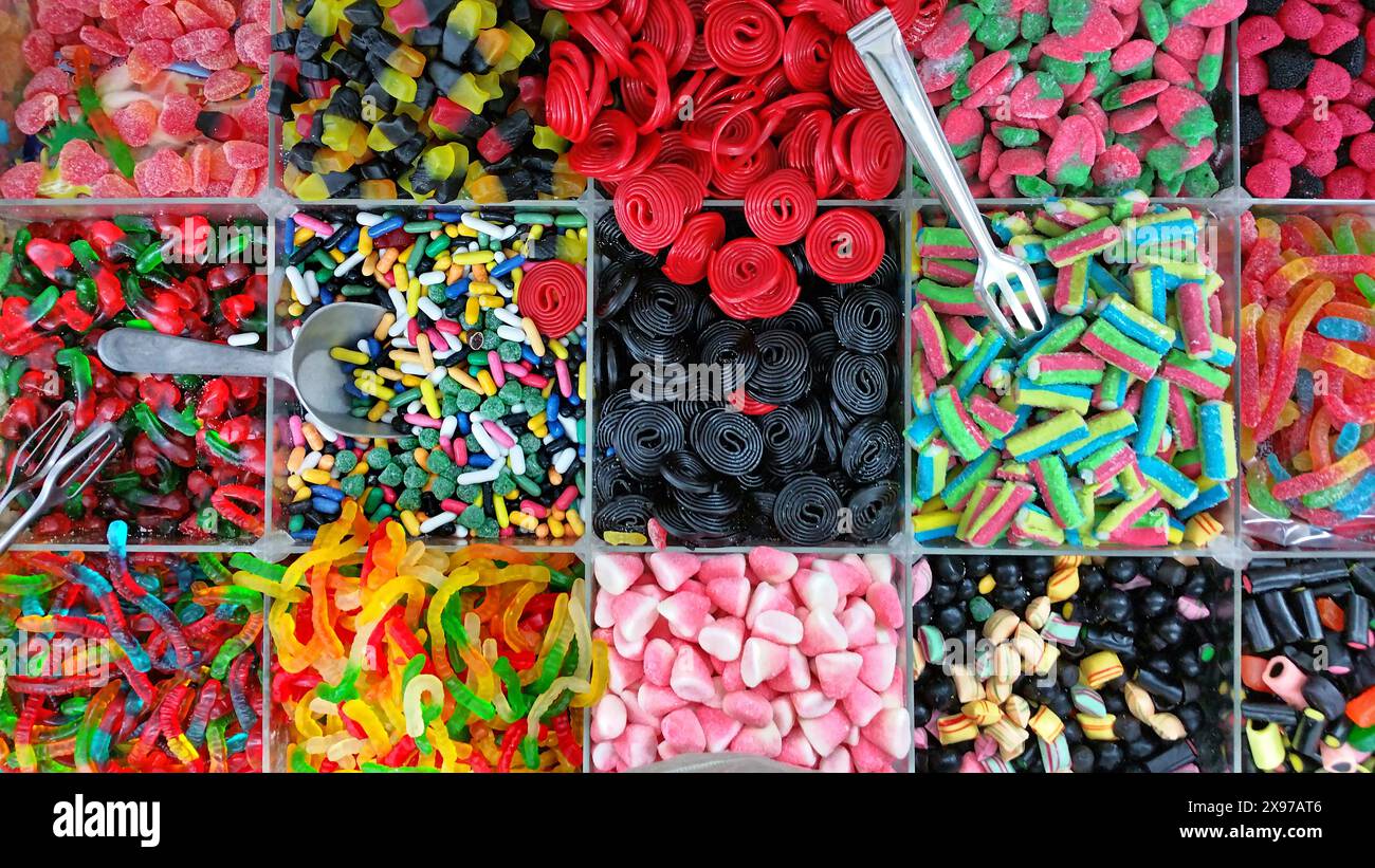 Colorful background of stacks of colorful and sweet gummies in the ...