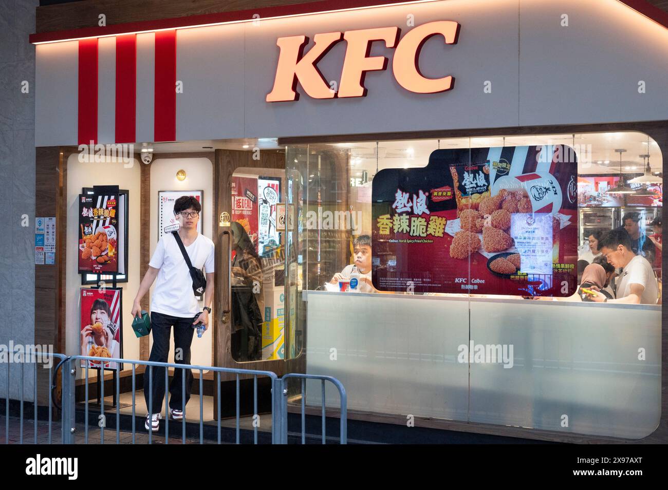 A customer is seen leaving the American fast food chicken restaurant chain Kentucky Fried ...