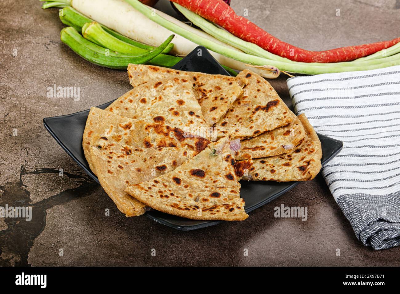 Indian vegetarian Aloo Paratha - bread with potato Stock Photo - Alamy