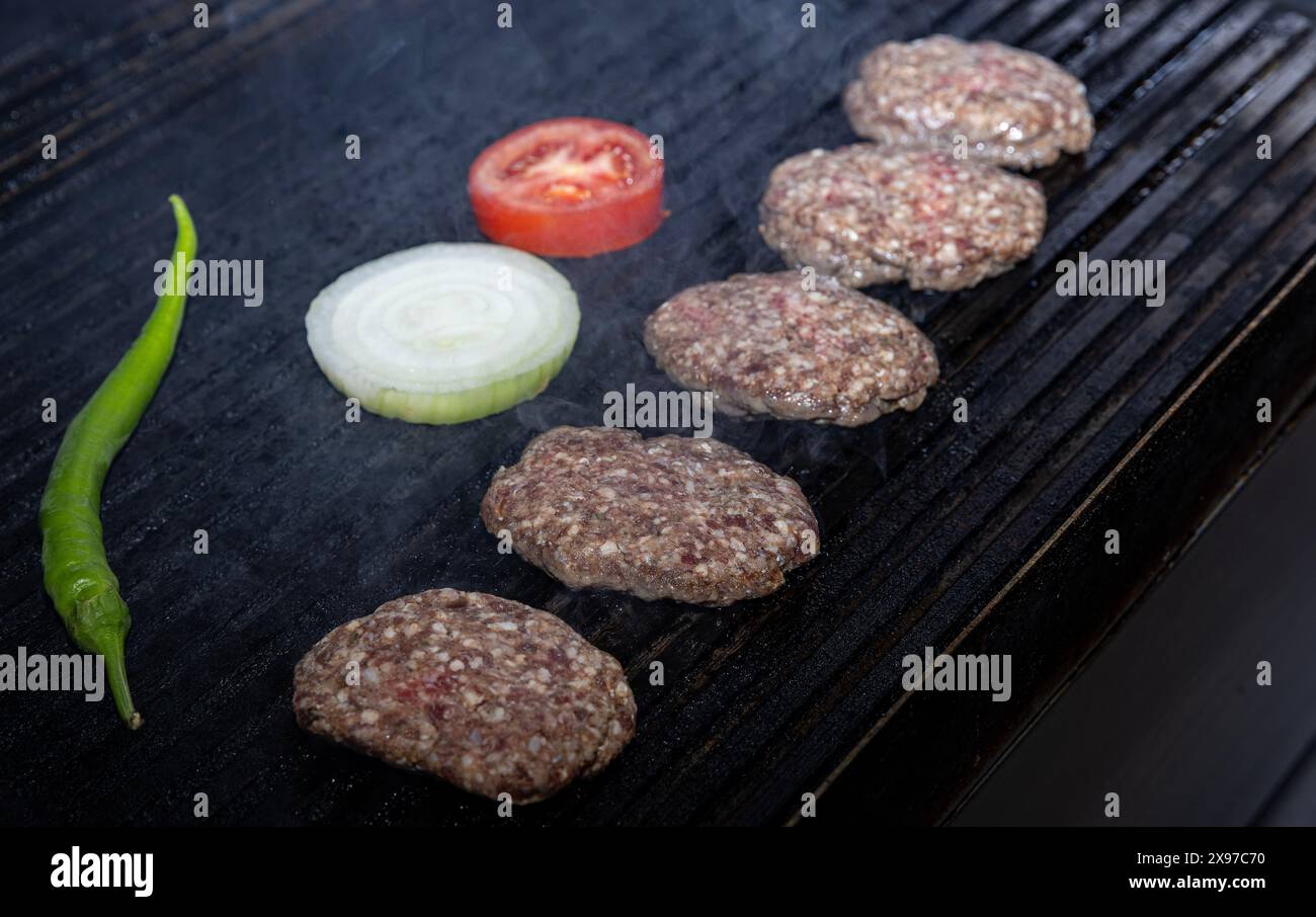 Turkish style meatballs grilled. Meatballs on the barbecue. Meatball ...