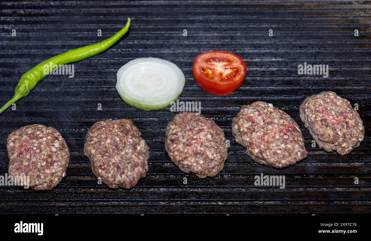 Turkish style meatballs grilled. Meatballs on the barbecue. Meatball ...