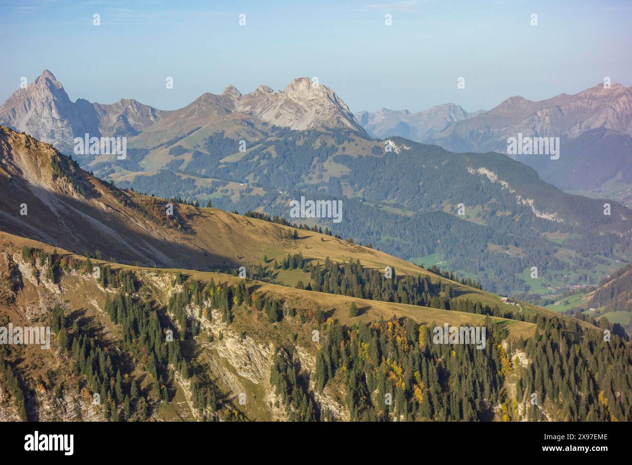 Panorama of a mountain landscape with forest, meadows and wide valley ...