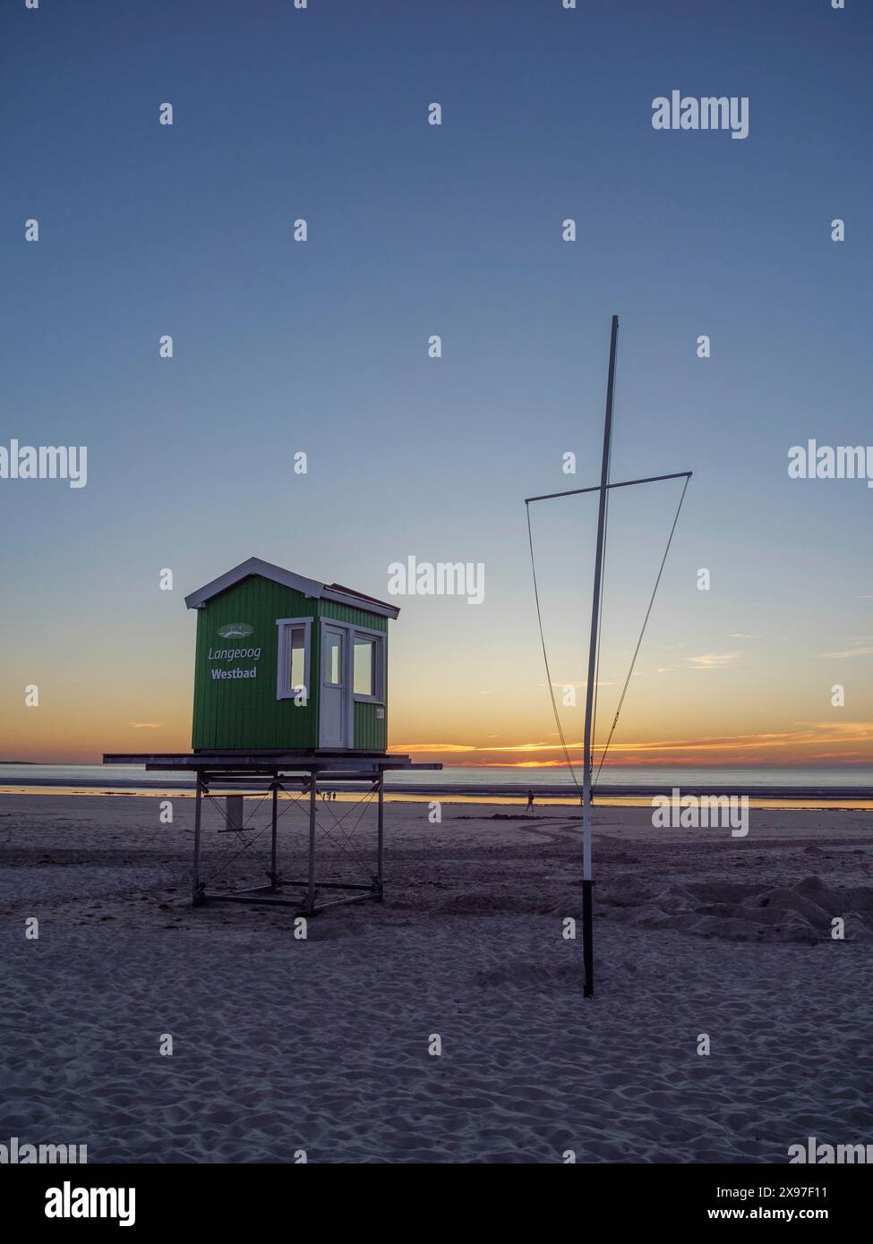 Beach hut at sunset, clear lines and colours give the scene a calm ...