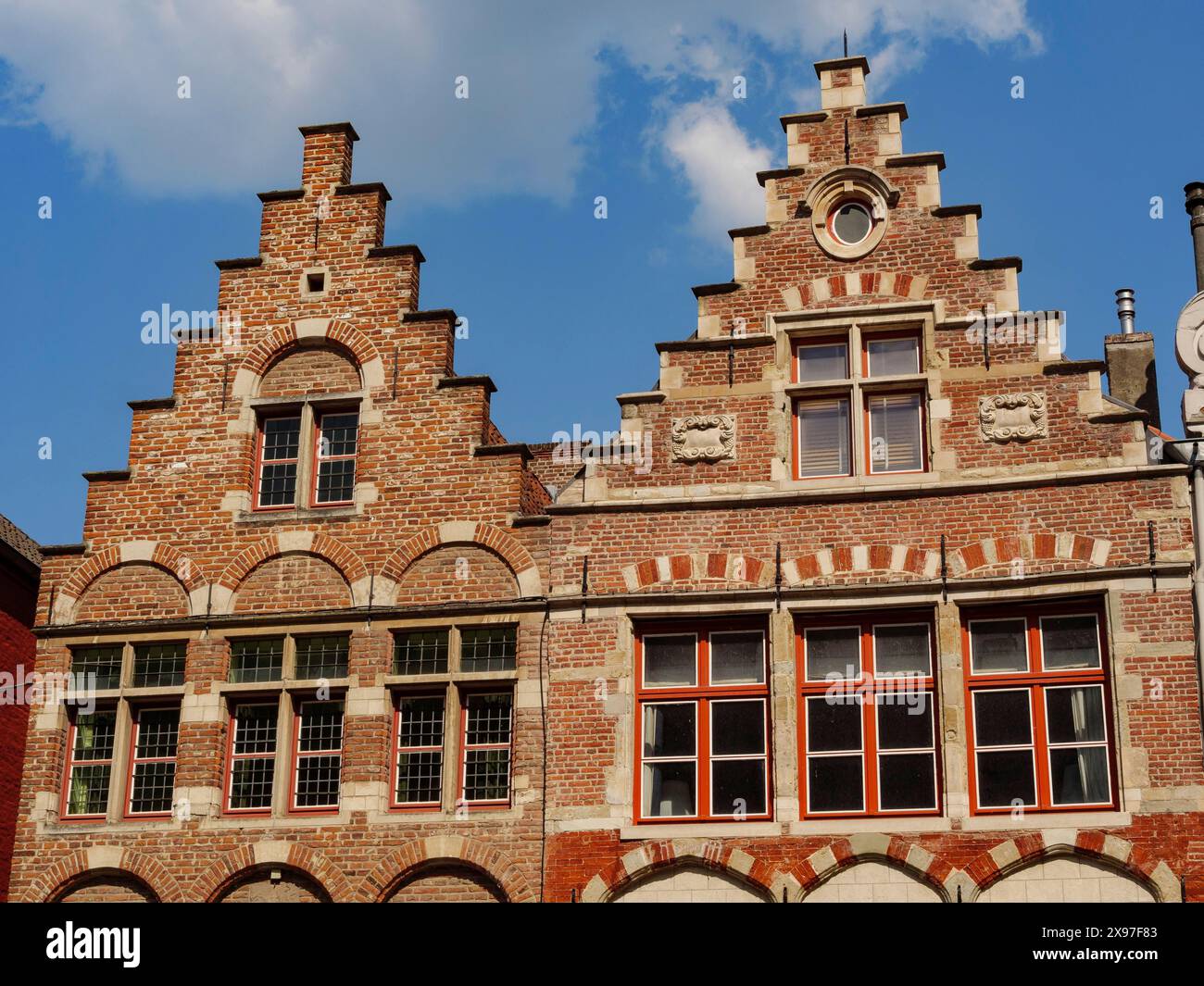 Brick architecture with magnificent stepped gables and windows ...