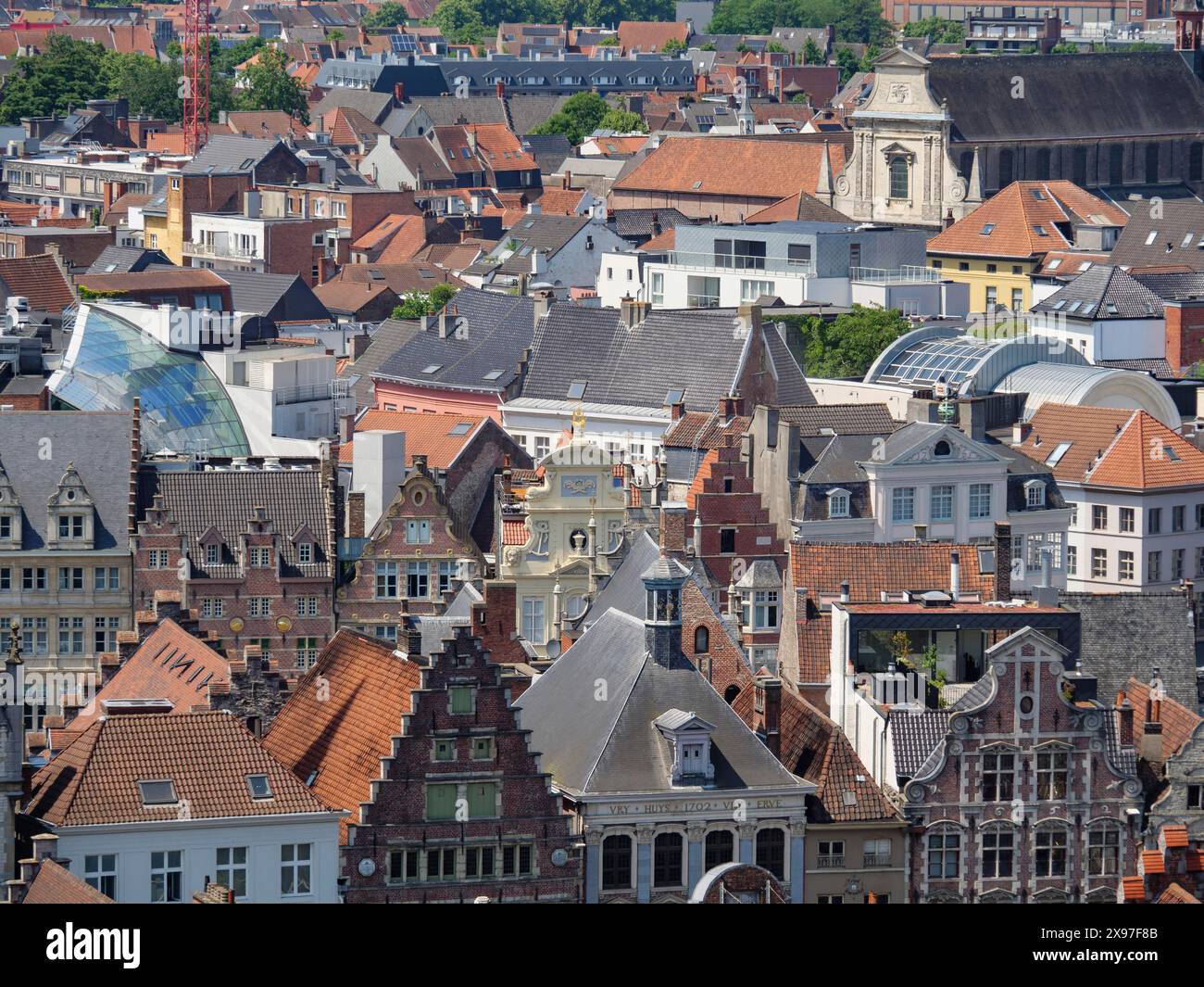 Overview of a city with colourful, historic houses and tiled roofs ...
