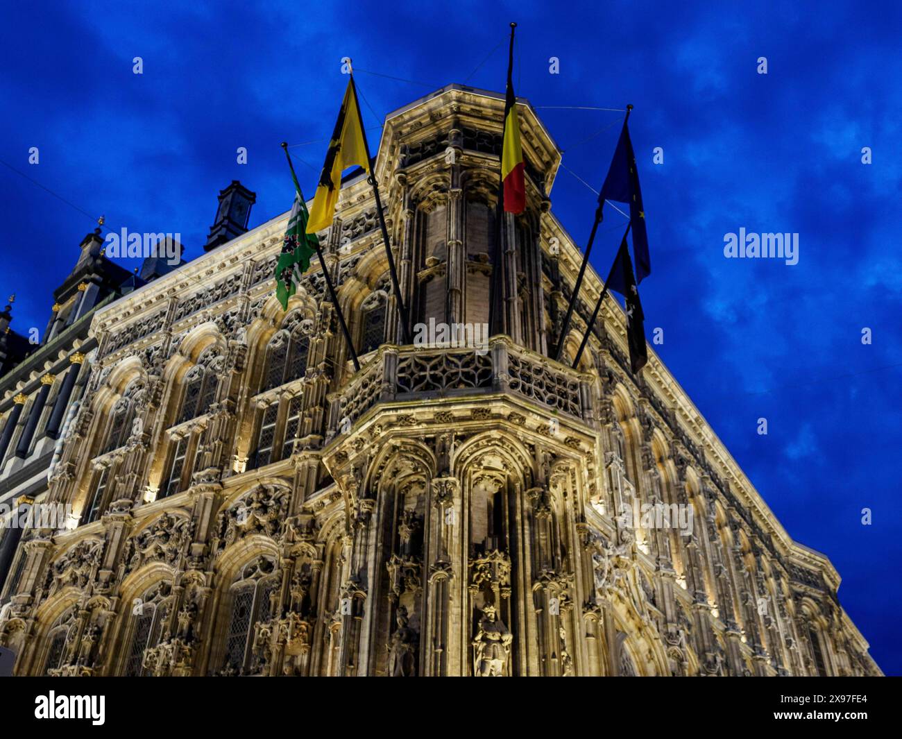 Magnificent illuminated building with many architectural details and ...