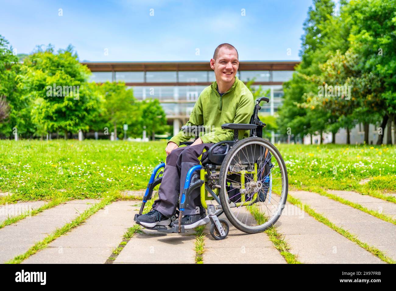 Full length portrait of a disabled man with cerebral palsy in the ...