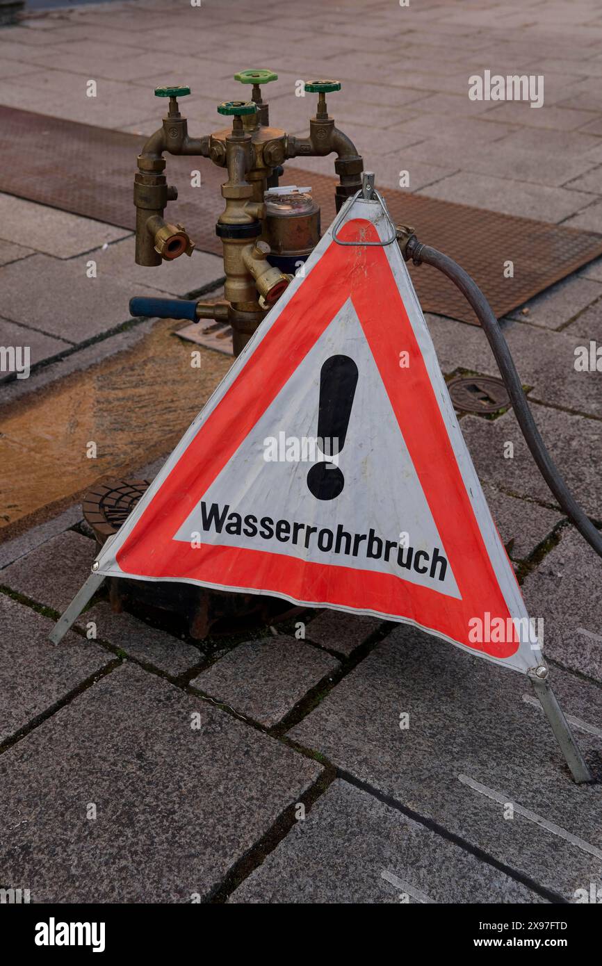 Burst water pipe, damage, pipe, warning sign, notice, sign, attention ...