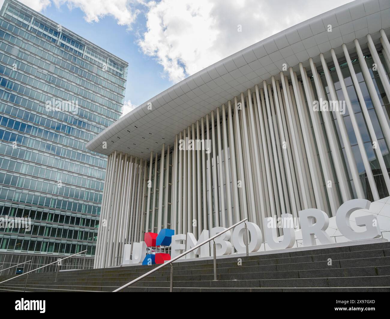 Modern building in Luxembourg with glass facade and striking columns ...