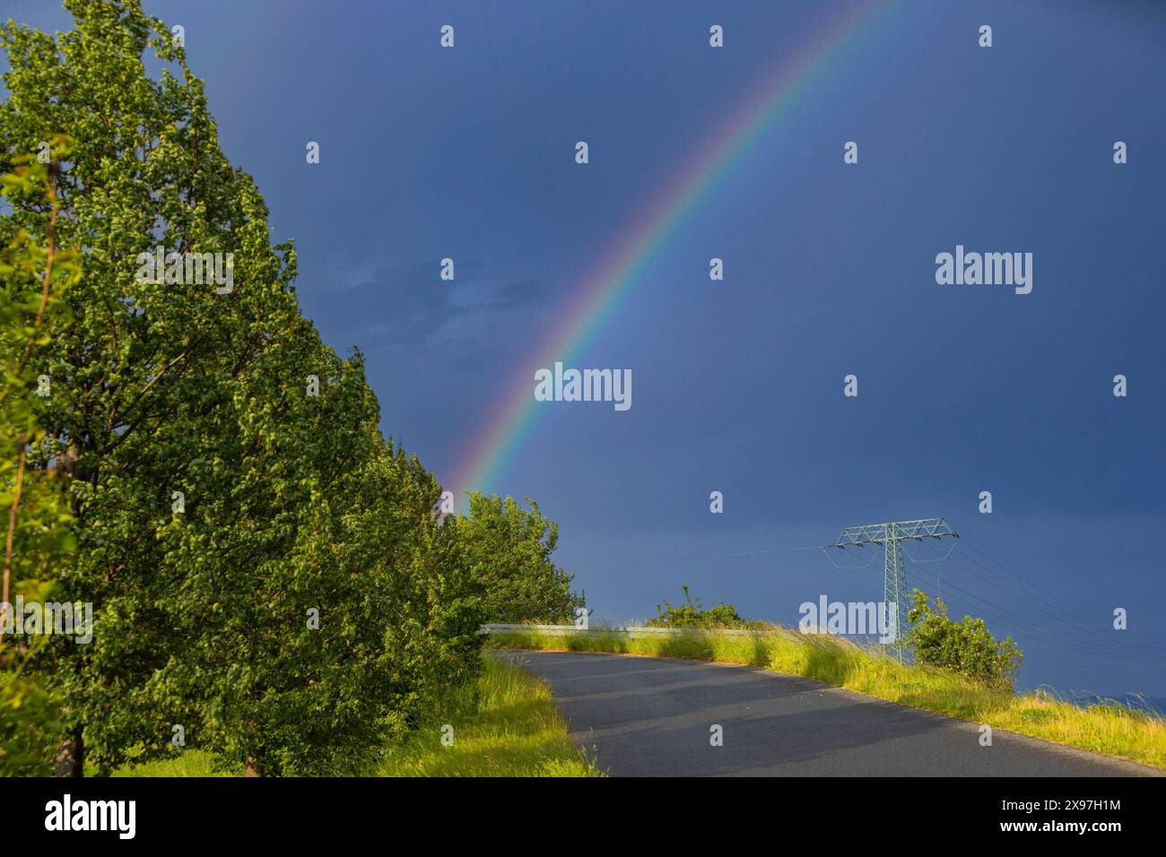 Thunderstorm cell with rainbow over fields near Krebs in the ...