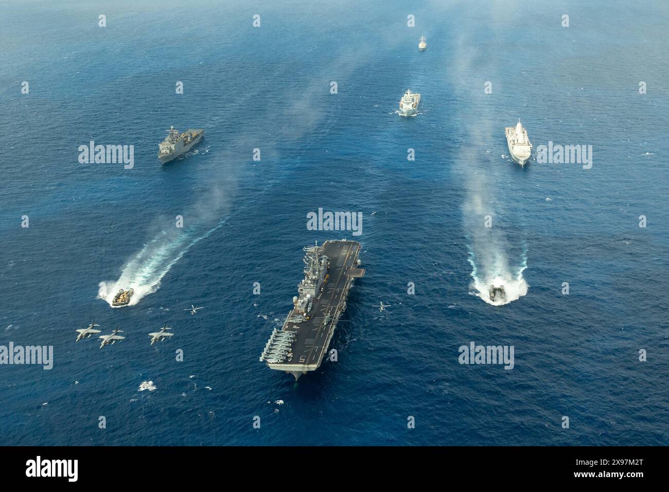 At Sea. 25th Feb, 2024. The Wasp-class amphibious assault ship USS ...