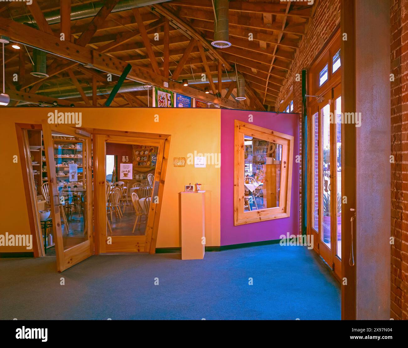 A colorful commercial interior space using art, and unusual shapes ...