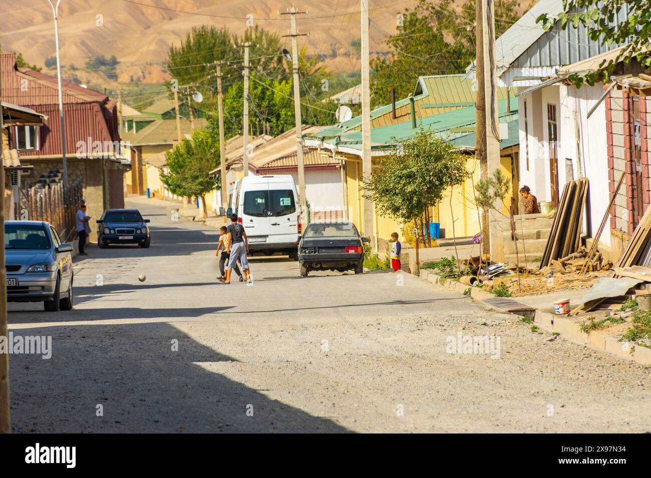 Penjikent, Tajikistan, 20 August 2023: Children playing football on the ...
