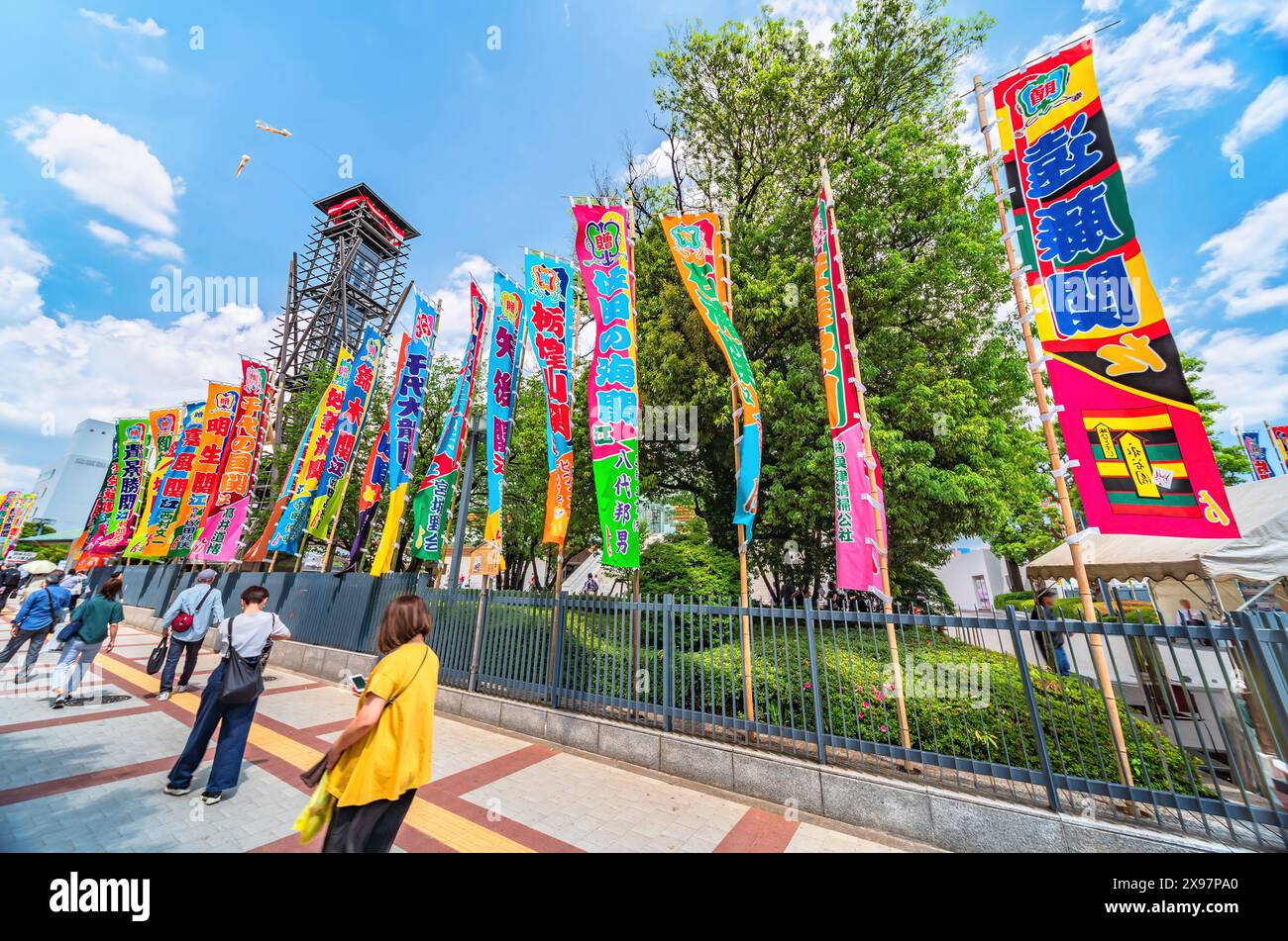 tokyo, ryogoku - may 17 2024: Japanese spectators walking along vibrant ...