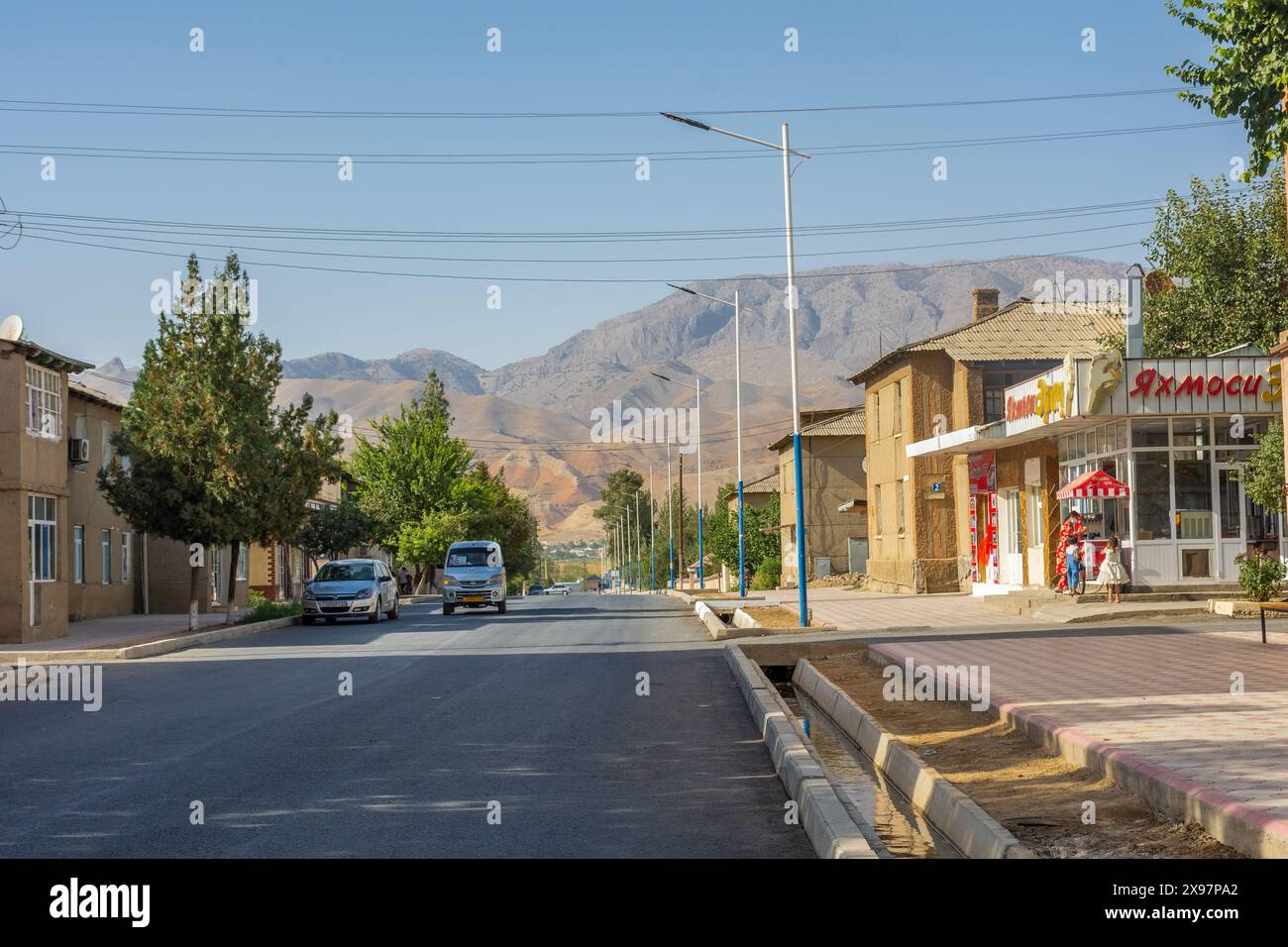 Penjikent, Tajikistan, 20 August 2023: Main road of Panjakent with the ...