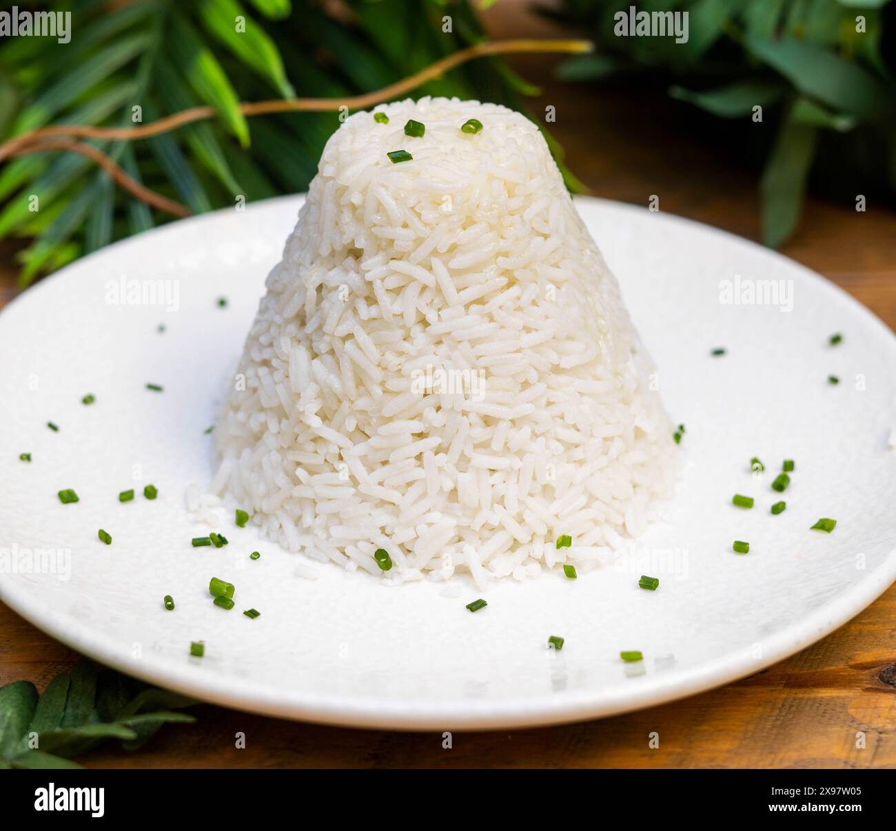 Tower of white rice of the basmati type as a garnish for meat Stock ...