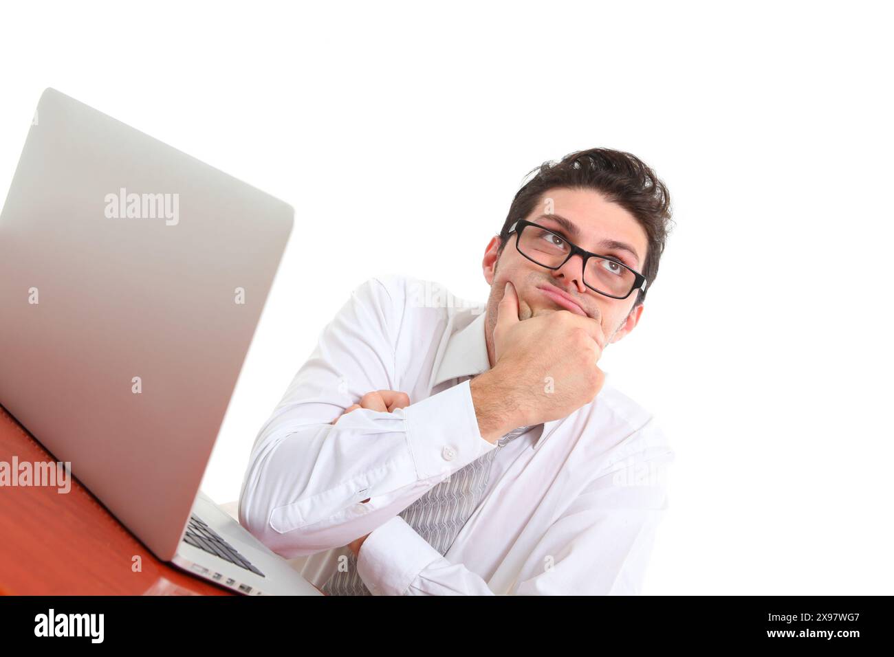 stressed out man with glasses on white background looking up thinking ...