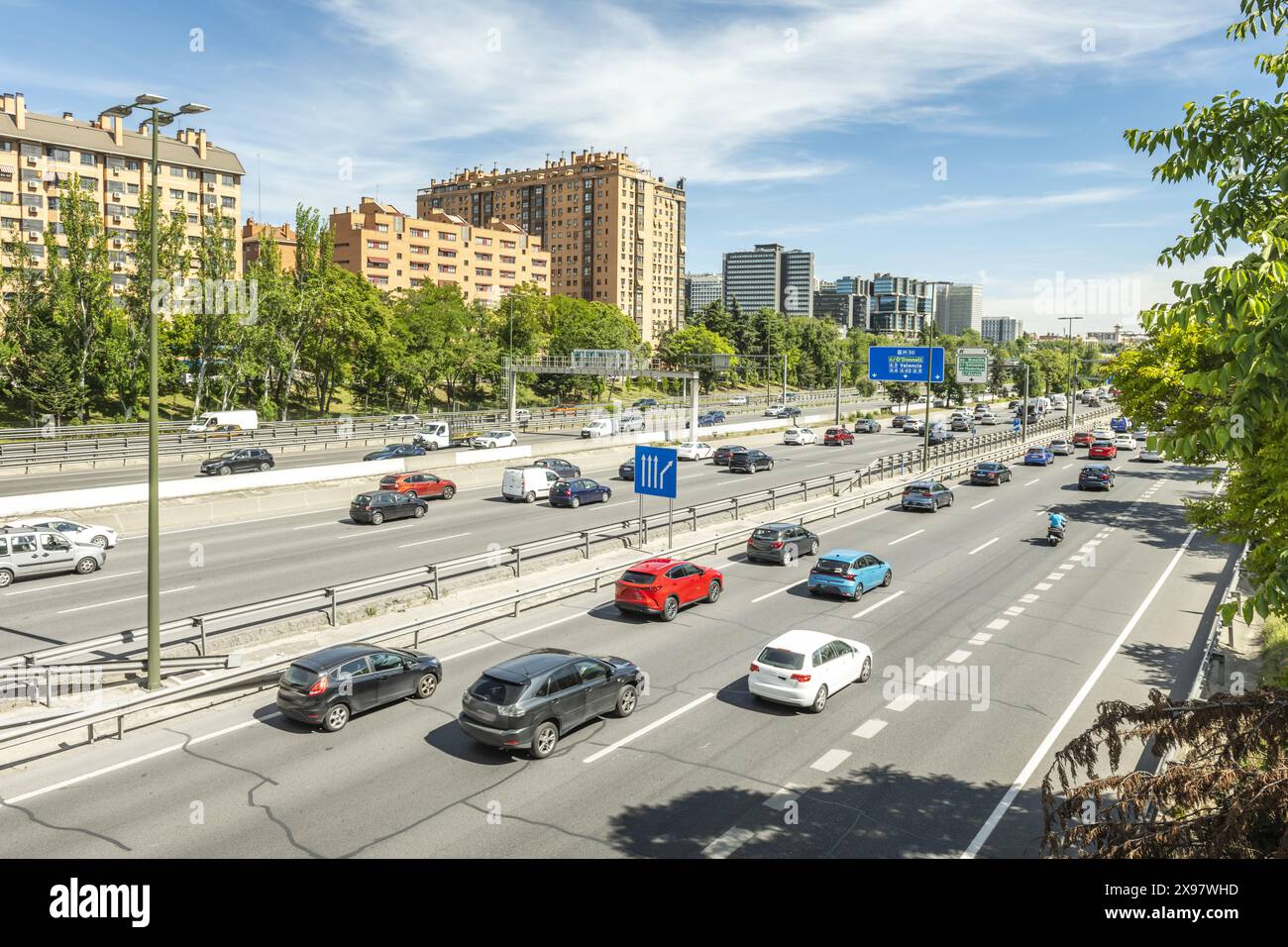 In organized traffic, vehicles traveling in opposite directions are ...