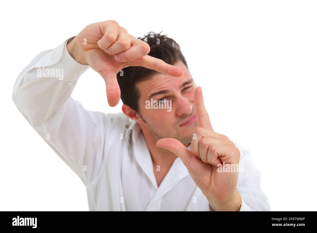 millennial man pretending taking photo on imaginary camera, looking ...