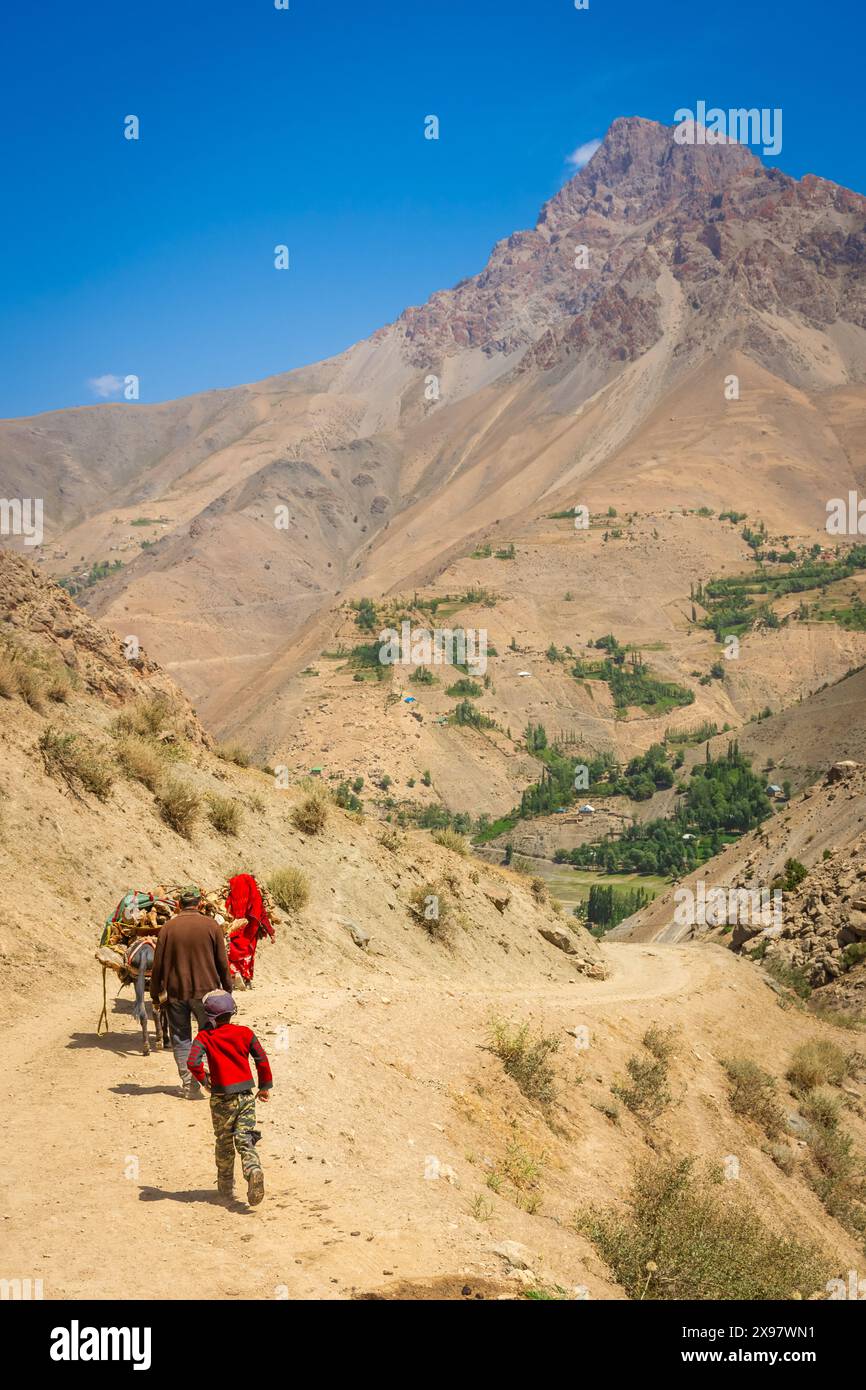 Haft Kul, Tajikistan, 21 August 2023:Family with donkeys in the Fann ...