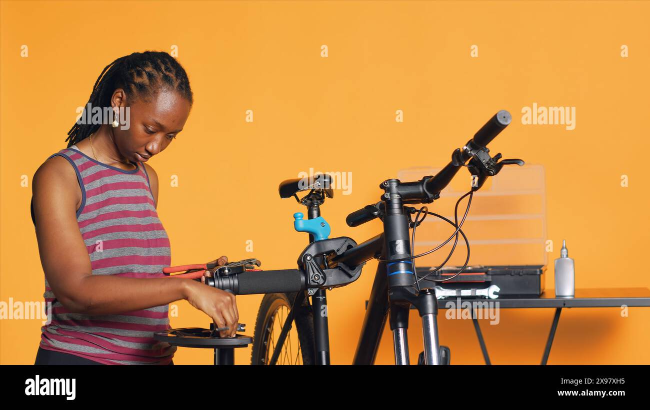 African american mechanic preparing work tools before starting ...