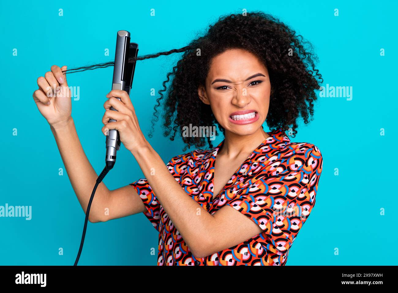 Photo of stressed angry lady dressed print shirt straighten hair curls ...