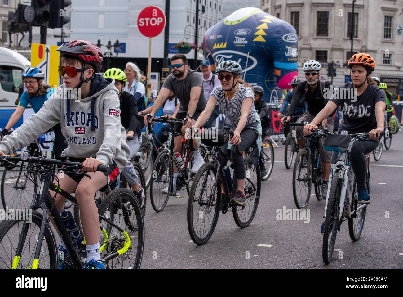 London, UK. 26th May, 2024. Cyclists ride through the Trafalgar Square ...