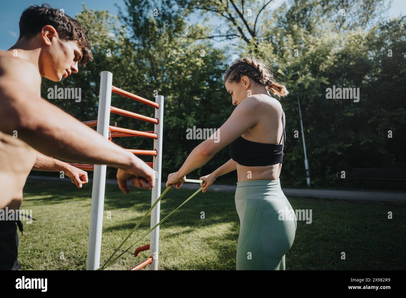 Young athletes performing exercise hi-res stock photography and images ...