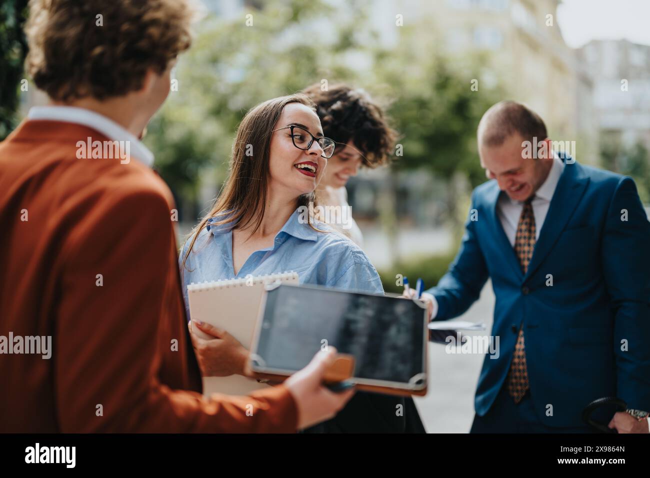 Outdoor business meeting with discussion and brainstorming among ...