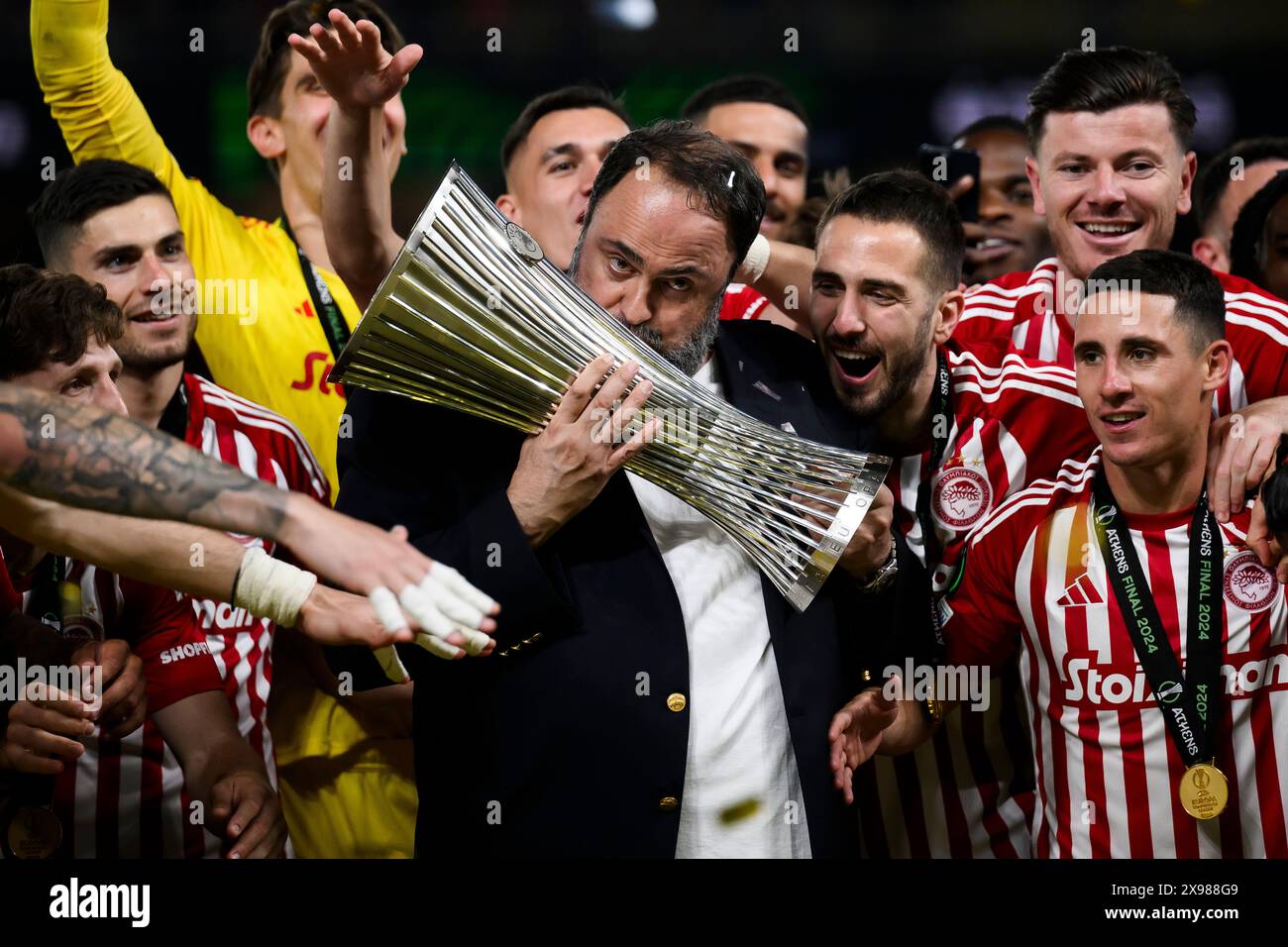 Athens, Greece. 30 May 2024. Evangelos Marinakis kisses the trophy during the UEFA Conference ...