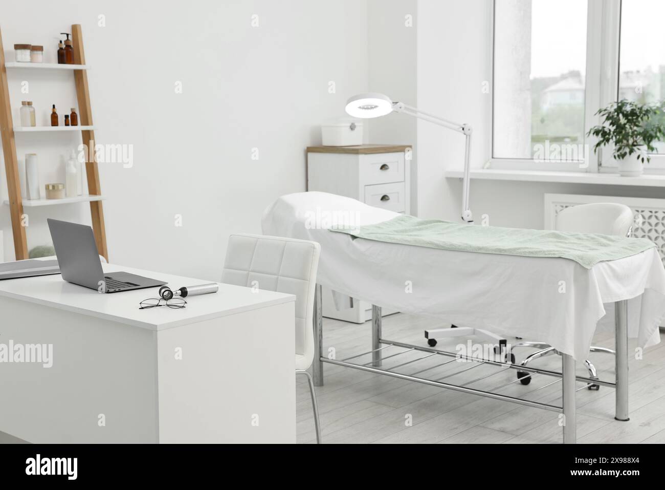Modern interior of dermatologist's office with examination table Stock ...