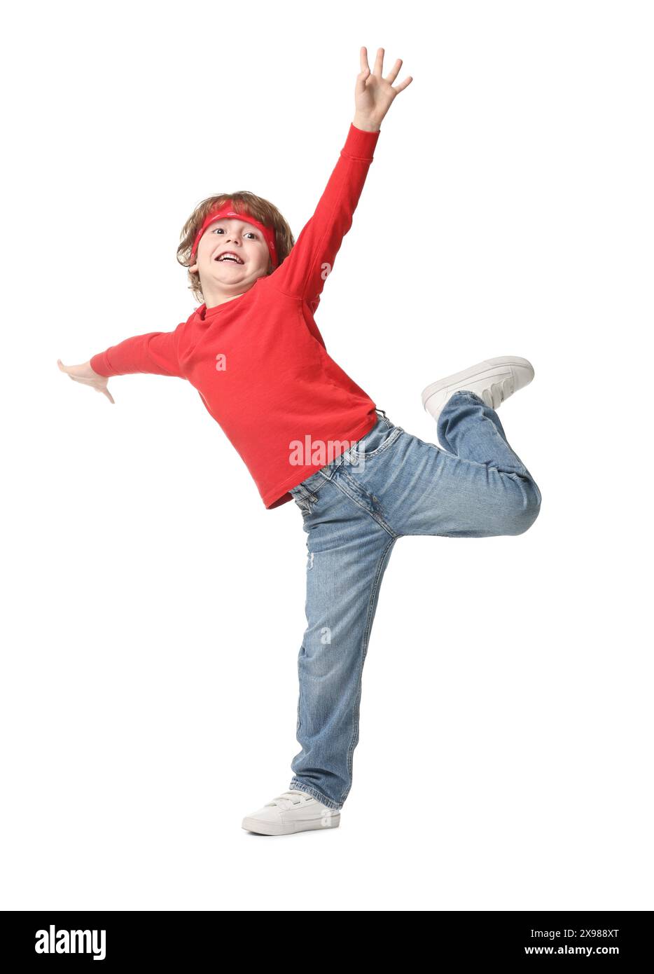 Happy little boy dancing on white background Stock Photo - Alamy