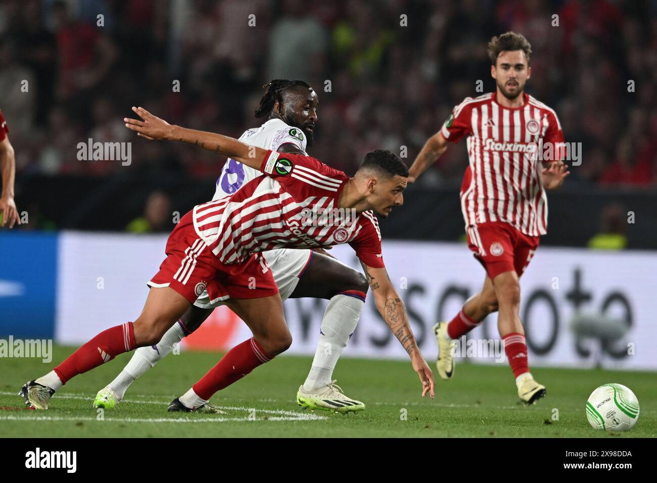 David Carmo (Olympiacos FC)M Bala Nzola (Fiorentina) during the UEFA ...